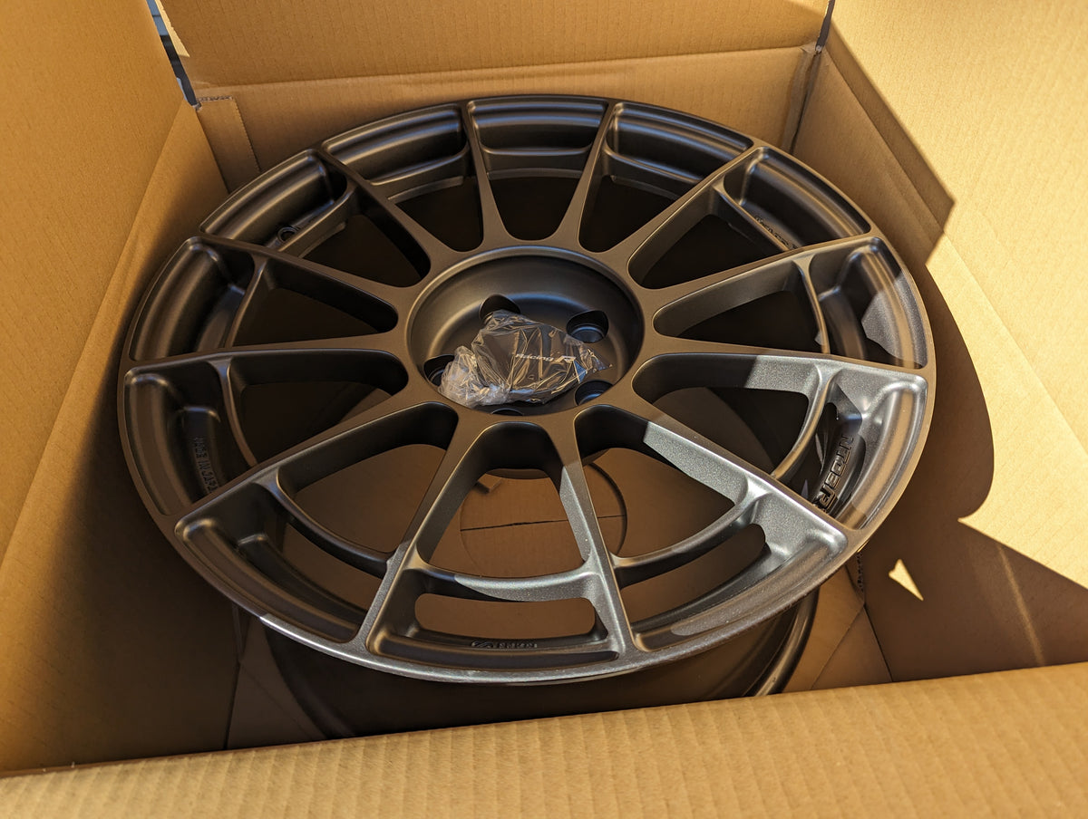 Enkei NT03+ (Dark Gunmetal) with Genuine Enkei Center Caps - 5x114.3 ...