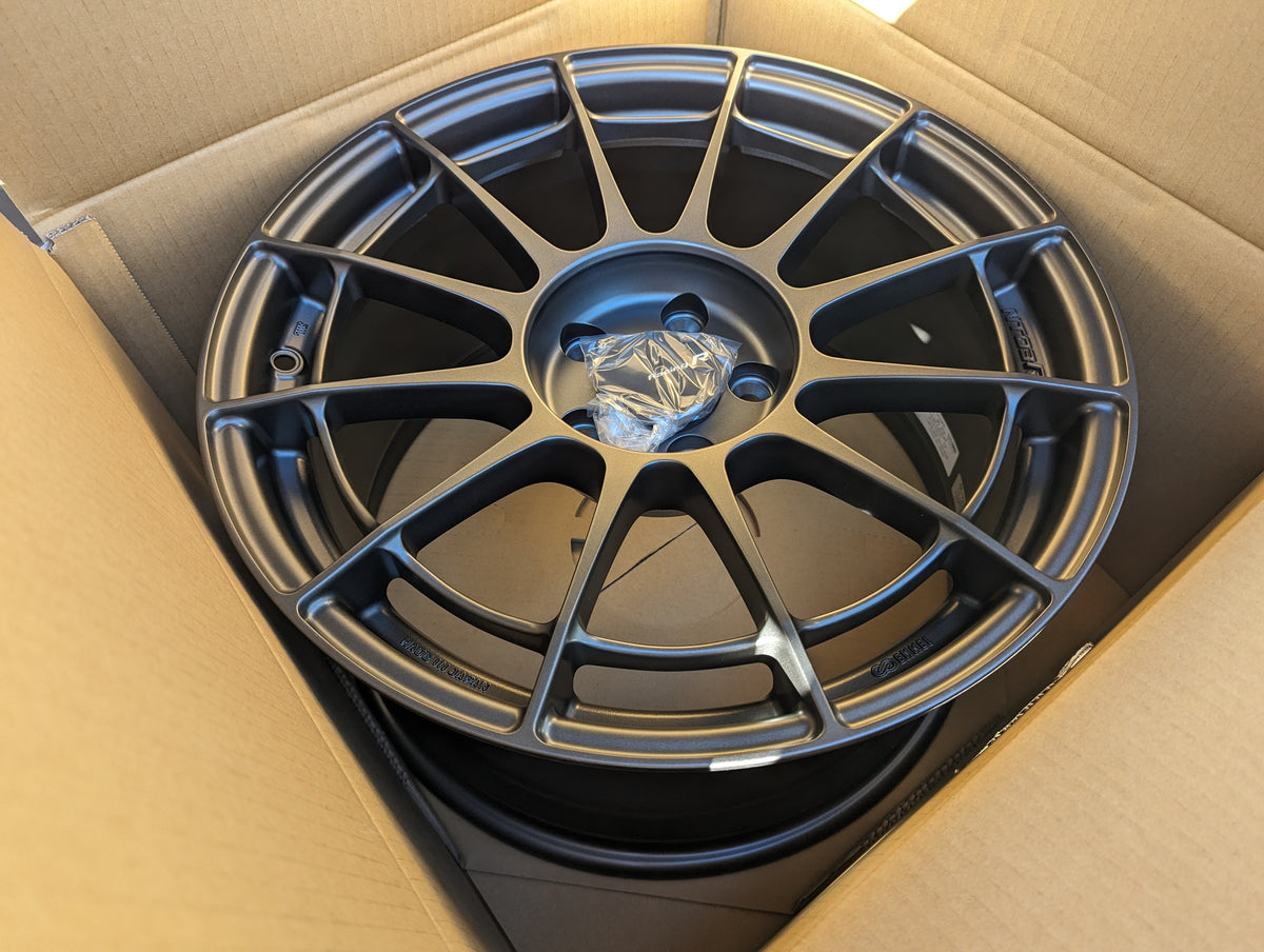 Enkei NT03+ (Dark Gunmetal) with Genuine Enkei Center Caps - 5x114.3 ...